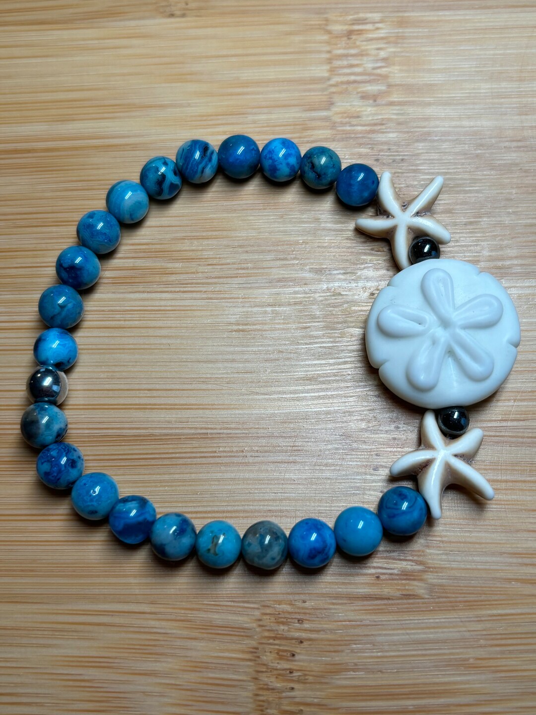 Small Sand Dollar (15mm) Focal With Gunmetal Starfish Beads and Larimar ...