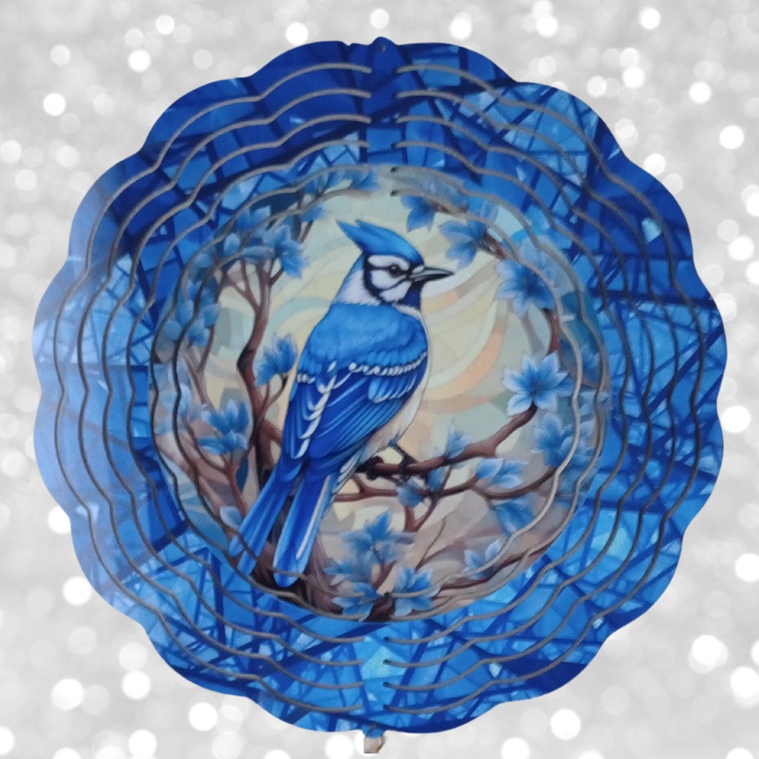 Blue Jay Wind Spinner, Flamingo Wind Spinner, and Dove Wind Spinner. 8 ...