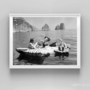 Floating Luncheon | Three Young Women Eat Spaghetti on Inflatable ...