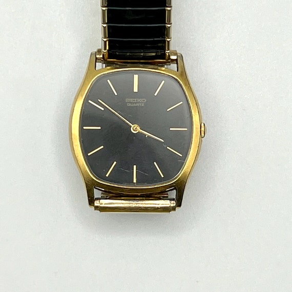 Seiko Vintage Unisex Black and Gold Rectangular Watch… - Gem