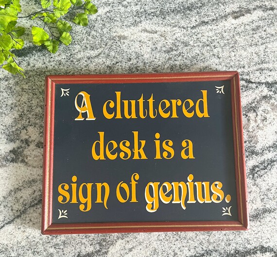 Cluttered Desk Sign Genius Quote
