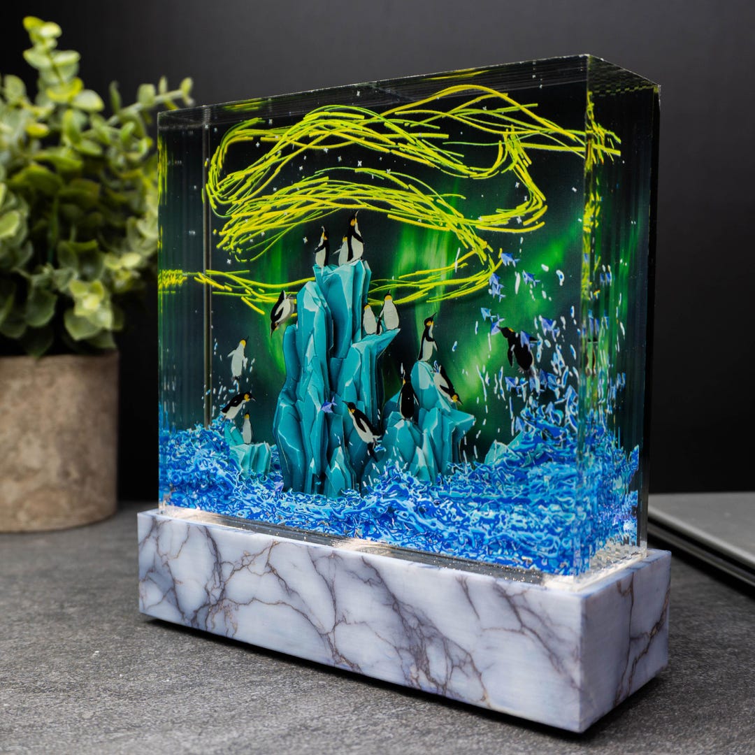 Aurora Penguin Resin Sculpture – Layered Epoxy Art of Penguins Playing ...