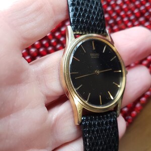Vintage Seiko Men's Watch! 1980's Black and Gold, Leather Band. New Battery! 5Y30-7A79 - Etsy