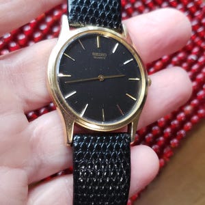Vintage Seiko Men's Watch! 1980's Black and Gold, Leather Band. New Battery! 5Y30-7A79 - Etsy