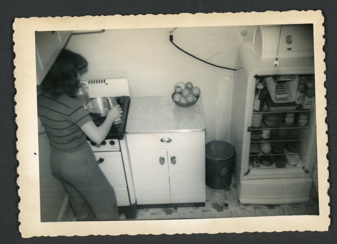 Woman Housewife Cooking in Cramped Kitchen Seen From Above Mid Century ...