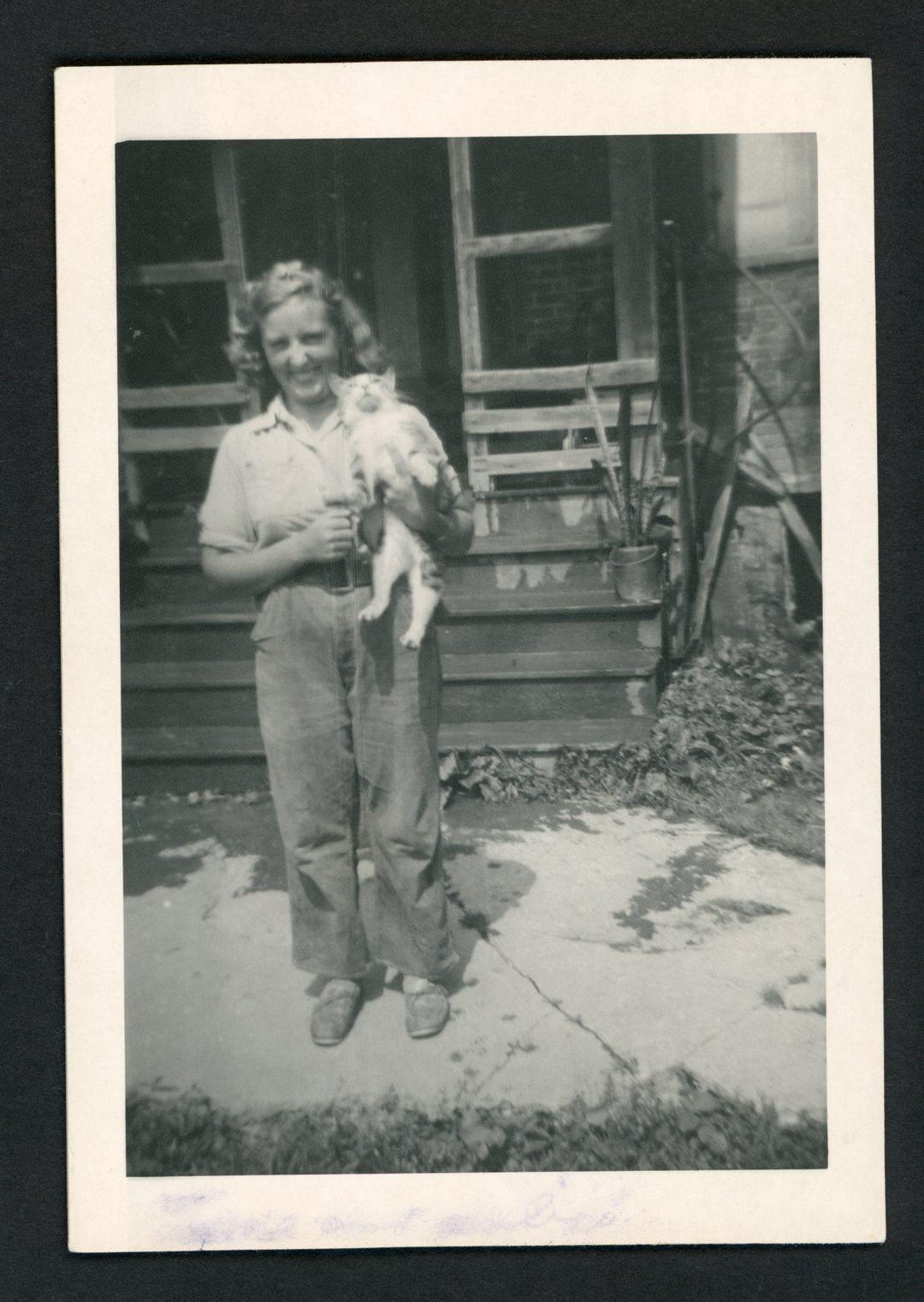 Put Me Down Grinning Woman Holding Squirming Cute Kitten Original ...