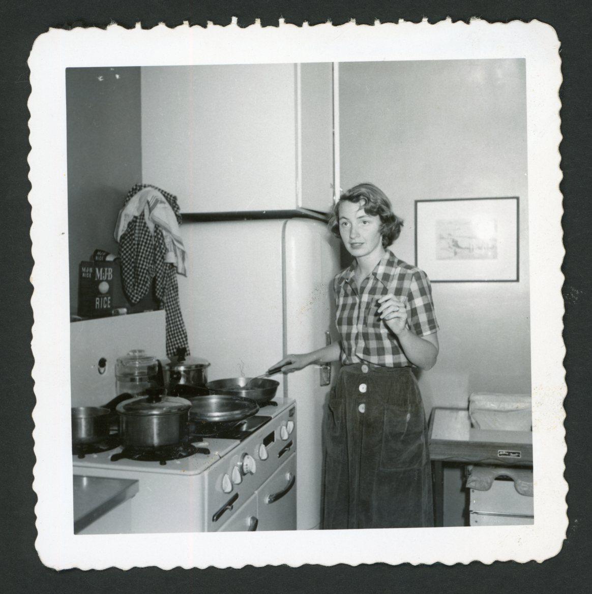 Woman Housewife Cooking in Cramped Kitchen Mid Century Interior ...