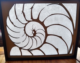 NAUTILUS Shell Silhouette Paper Cutout in Shimmery Light Yellow ...