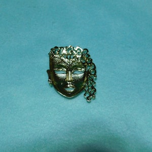 What's Trending: Gold Tone Metal Face Pin Mask Brooch - Etsy