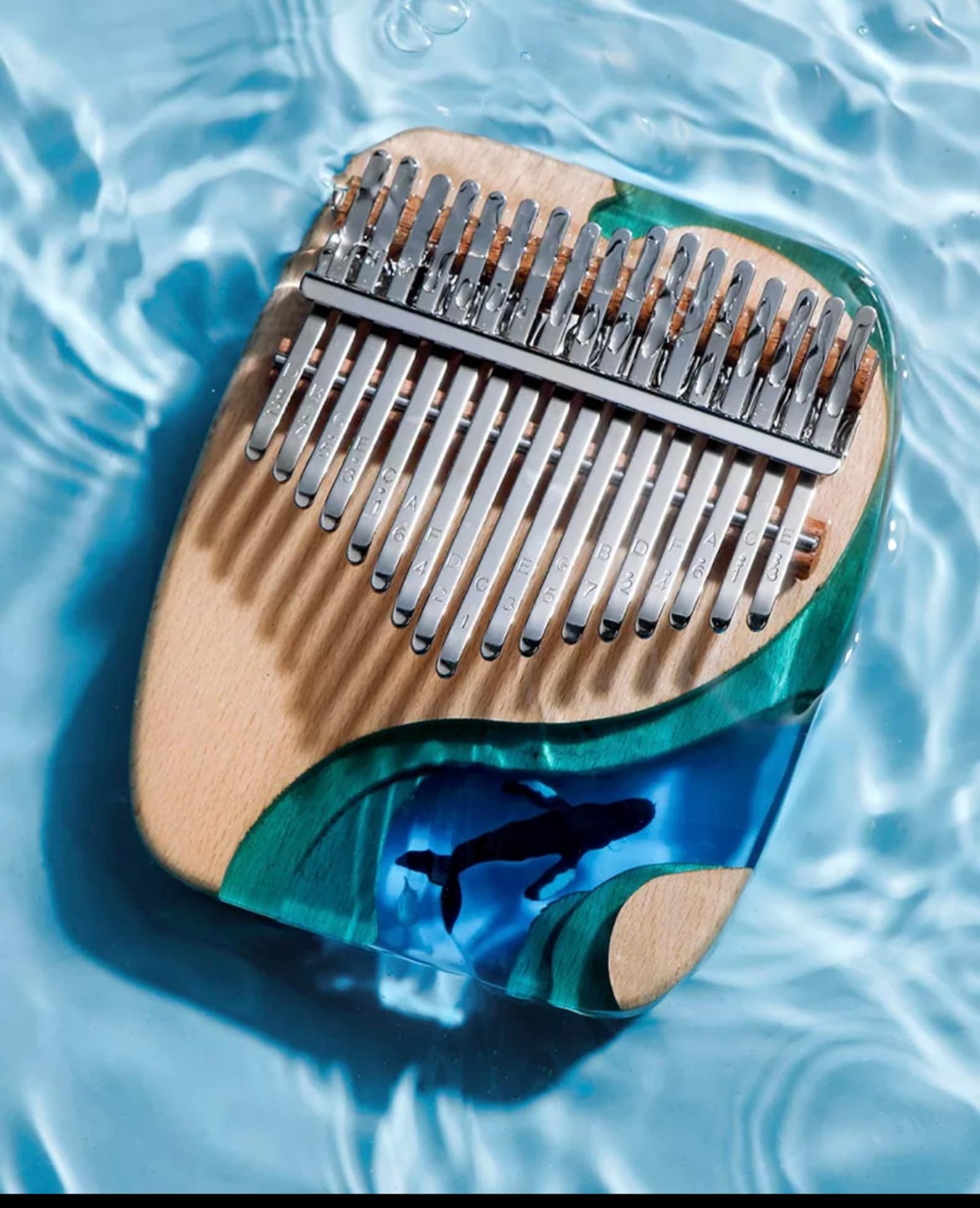 Kalimba Thumb Piano Musical Instrument. 17 Key Instrument With Ocean ...