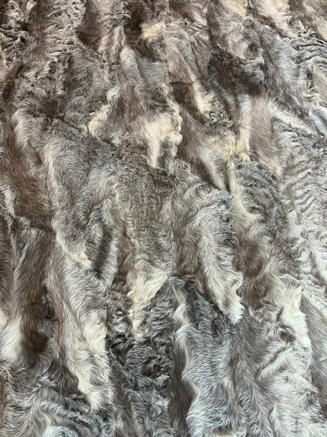 Ηigh-quality Fur Pleter of Astrakhan Leg Fur in Gray - Brown Color ...