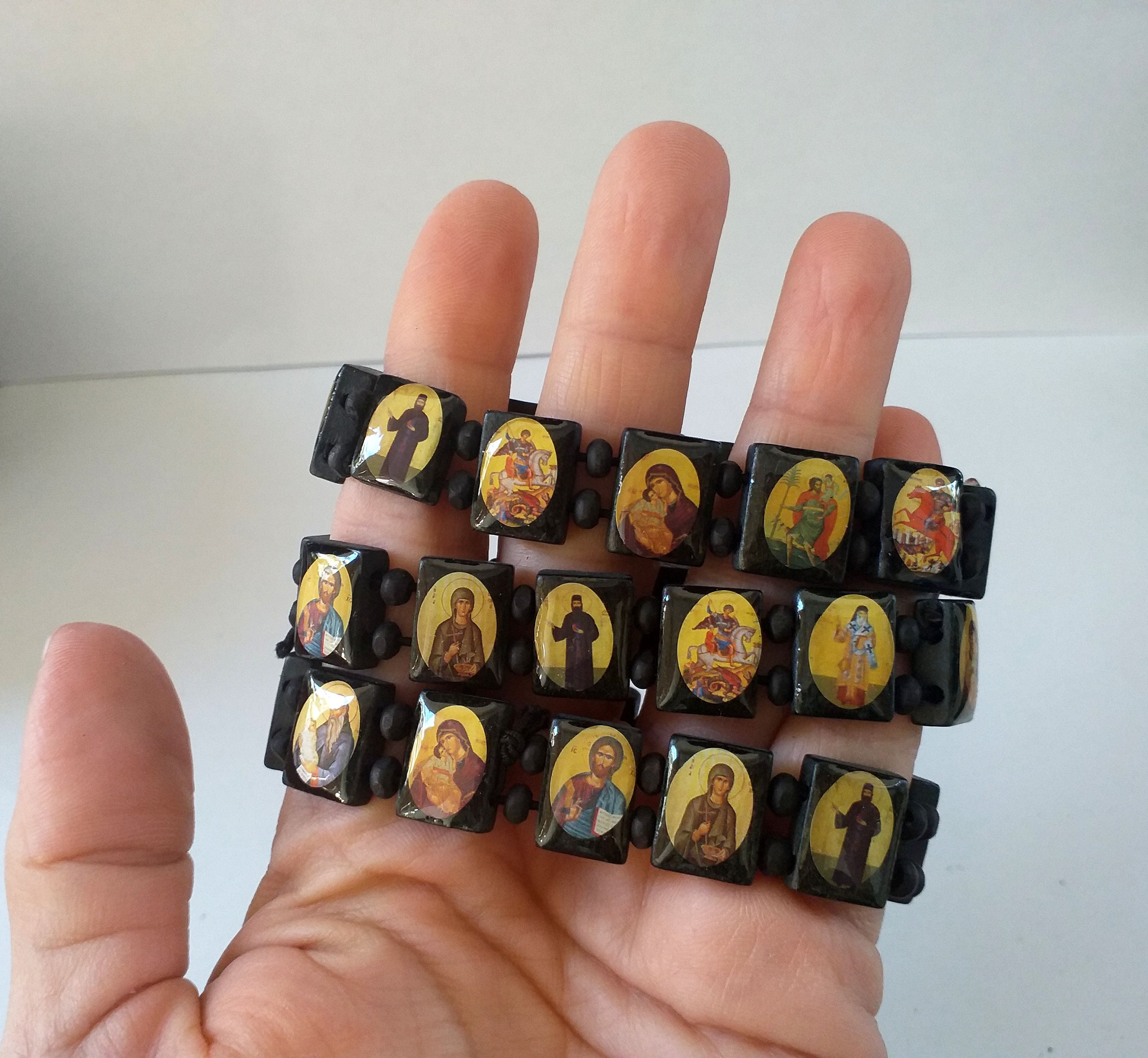Religious Elastic Bracelet With Holy Icons on Wooden Laminated Black ...