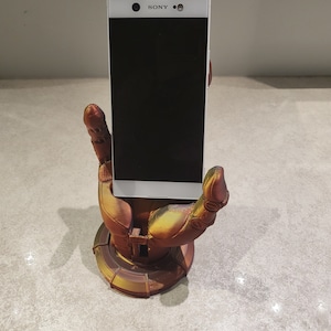 Robotic Hand Phone Holder Stand With Charging Cord Slot - Video Game ...
