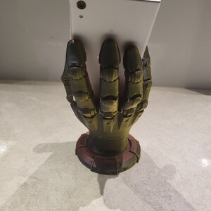 Robotic Hand Phone Holder Stand With Charging Cord Slot - Video Game ...