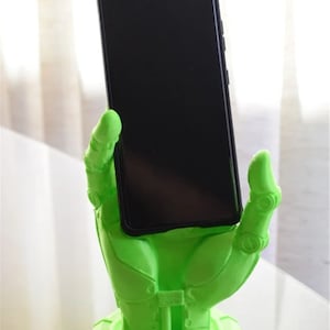 Robotic Hand Phone Holder Stand With Charging Cord Slot - Video Game ...