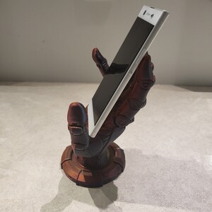 Robotic Hand Phone Holder Stand With Charging Cord Slot - Video Game ...