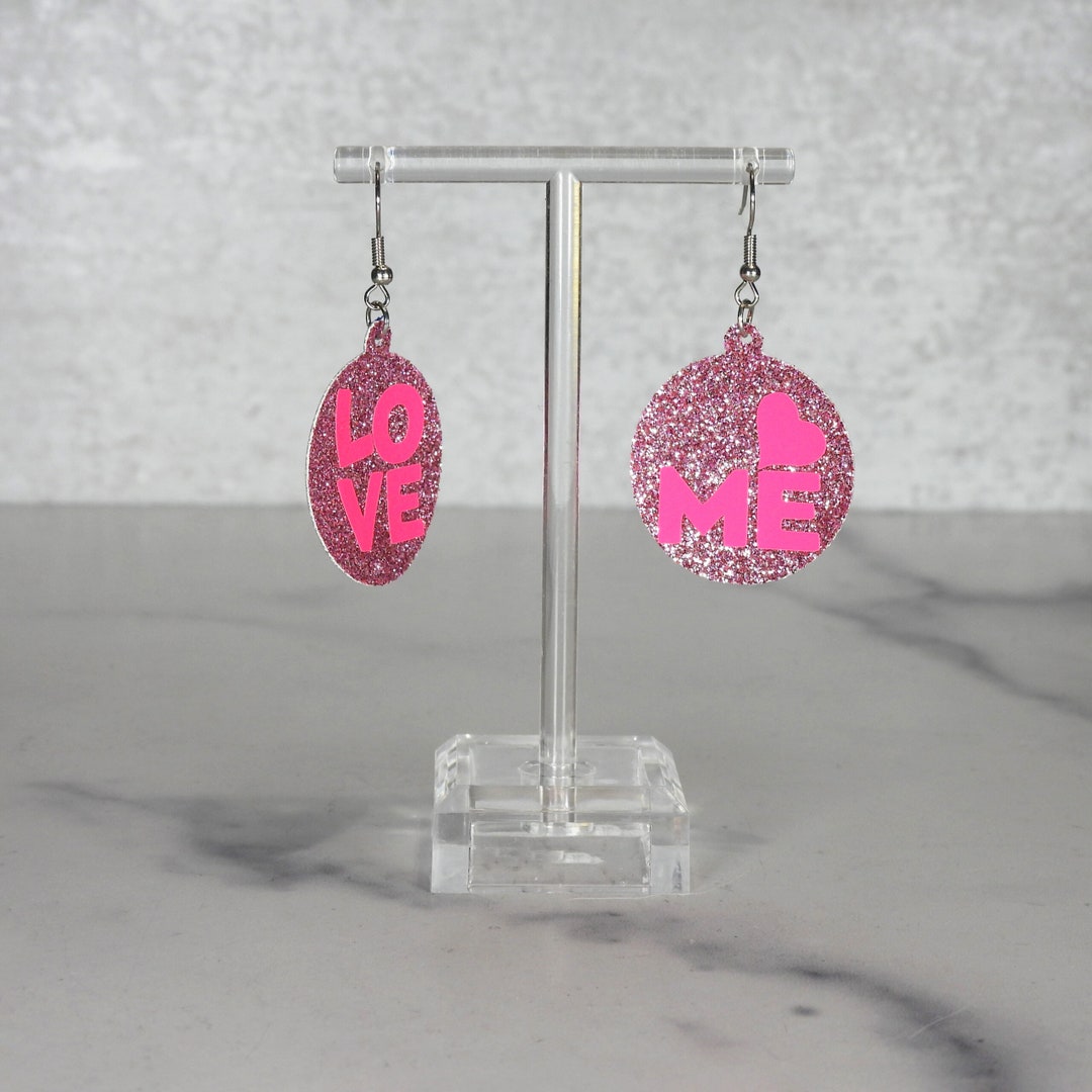 Pink Glitter With Neon Pink Love Me Text and Shiny Purple Backing ...