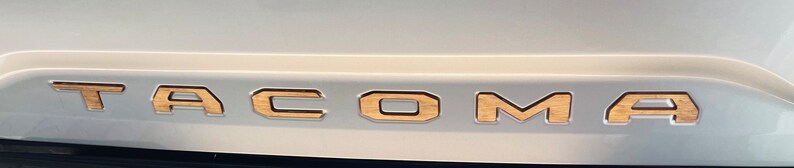 Custom 3-D Laser Engraved Natural Wood Toyota Tacoma Letters Vehicle ...