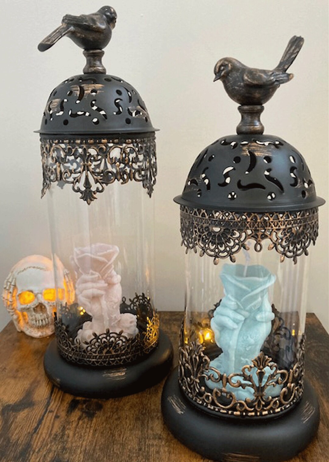 Hand Holding Rose With Skulls and Cross Bones Candle, Adams Family Hand ...