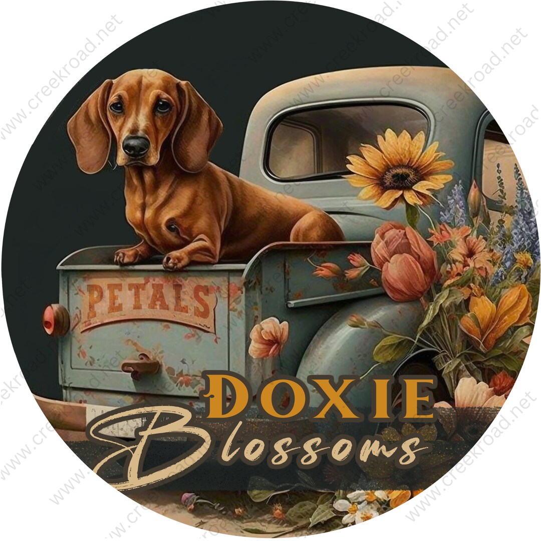 Doxie Blossoms Red Dachshund in Bed of Truck Wreath Sign-round-everyday ...