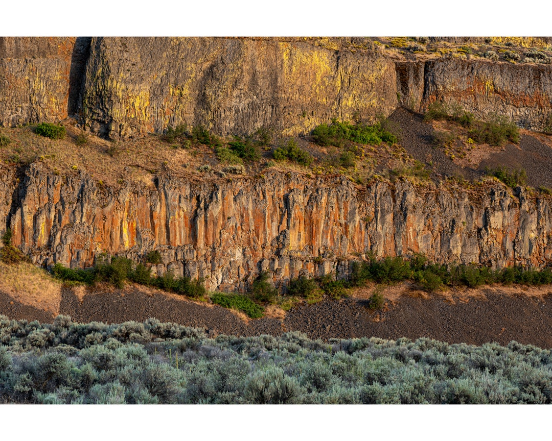 Landscape Photograph of Sagebrush Below Lichen Covered Cliffs of the ...