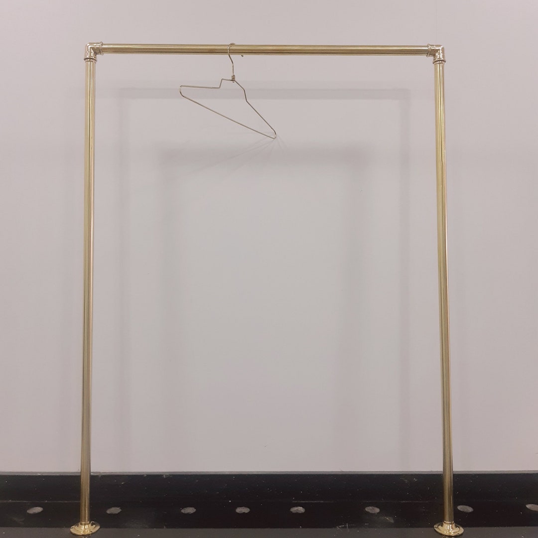 Ceiling Mounted Brass Clothes Rail | Minimalistic Brass Clothes Rack ...