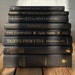Black Book Stack, Black Stacked Books, Black Book Decor, Black Coffee ...