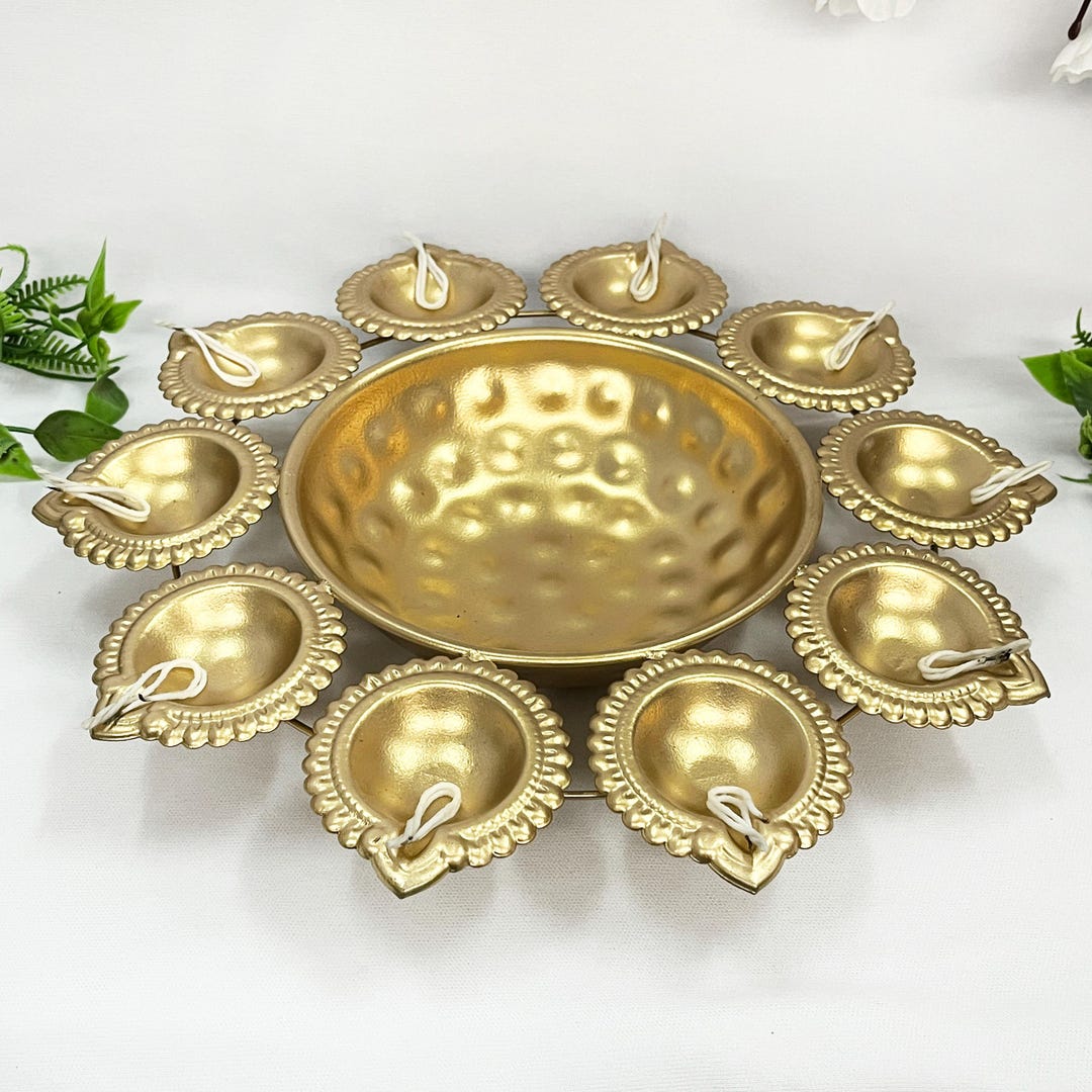 Handcrafted Metal Diya Holder Set With 10 Candle Lamps and Center Bowl ...