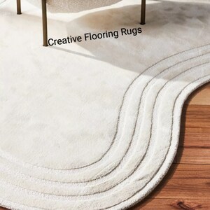 Solid Plain Ivory Kidney Shape Handmade Woolen Tuffted Carpet Premium ...