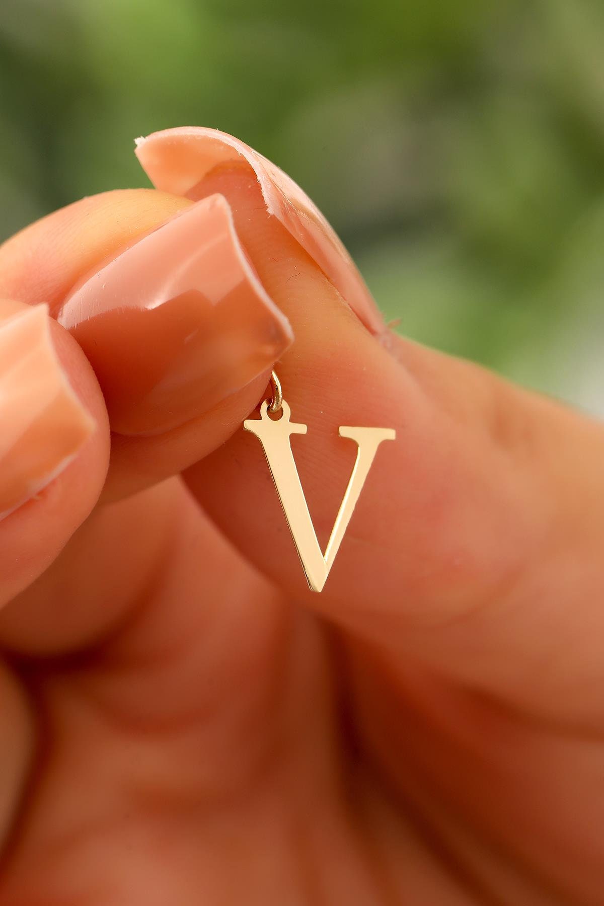 V Letter In Gold