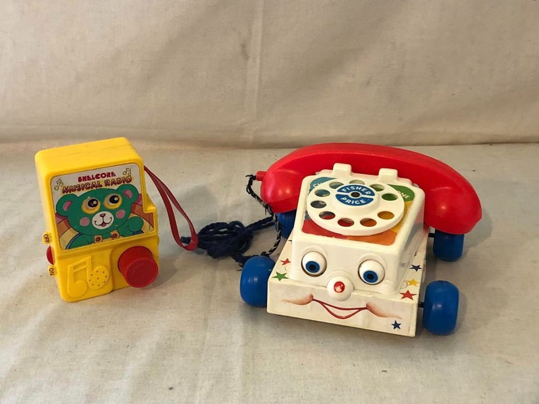 Vintage 1960's Fisher Price Chatter Telephone & 1982 Shelcore Wind up ...