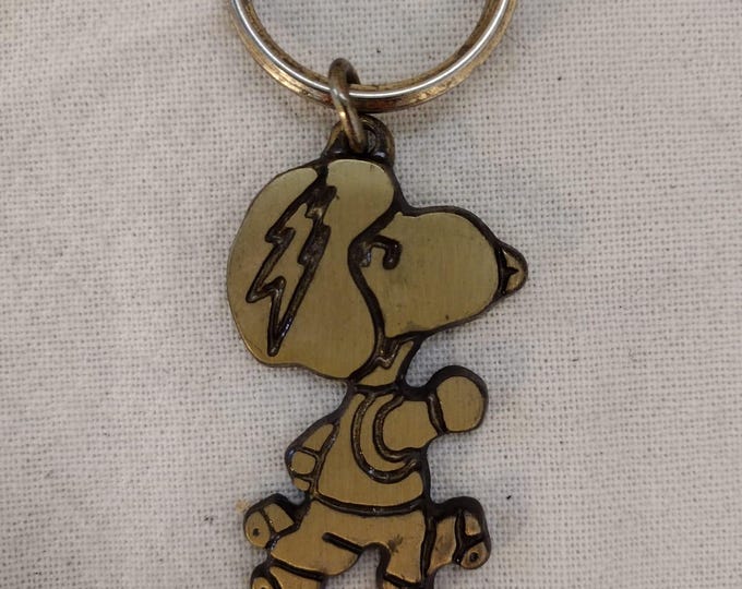 Vintage 1958 Brass Peanuts Snoopy Rollerskating Key Chain. - Etsy