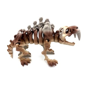 3D Printed Articulated Sabertooth Tiger Skeleton: Jurassic World Desk ...