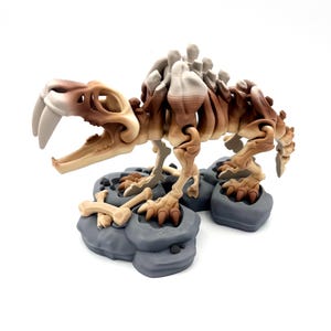 3D Printed Articulated Sabertooth Tiger Skeleton: Jurassic World Desk ...