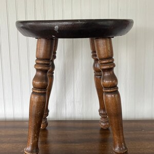Rustic Wooden Stool With Turned Legs Functional and Decorative Home ...