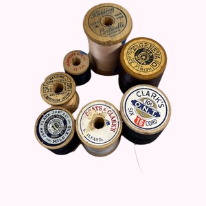 Timeless Treasures: Vintage Thread Set - 7 Spools on Antique Wooden ...
