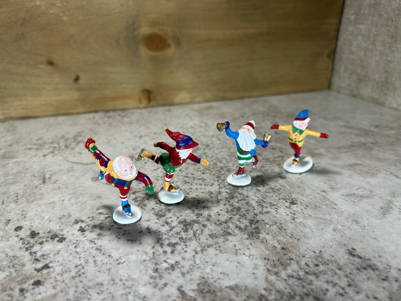 Taking a Break Vintage 1990s Miniature Ice Skating Santa Elf North Pole ...