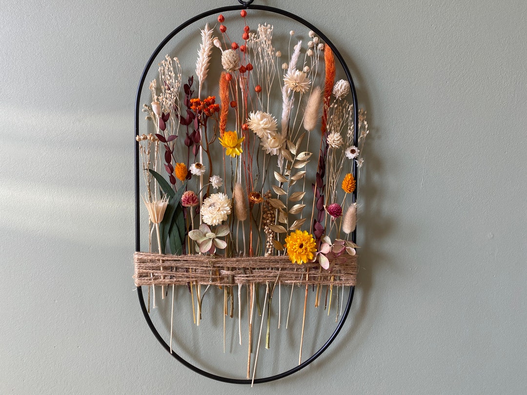 Handcrafted Autumn Blooms: Unique Blossom Creation on Black, Oval Hoop ...