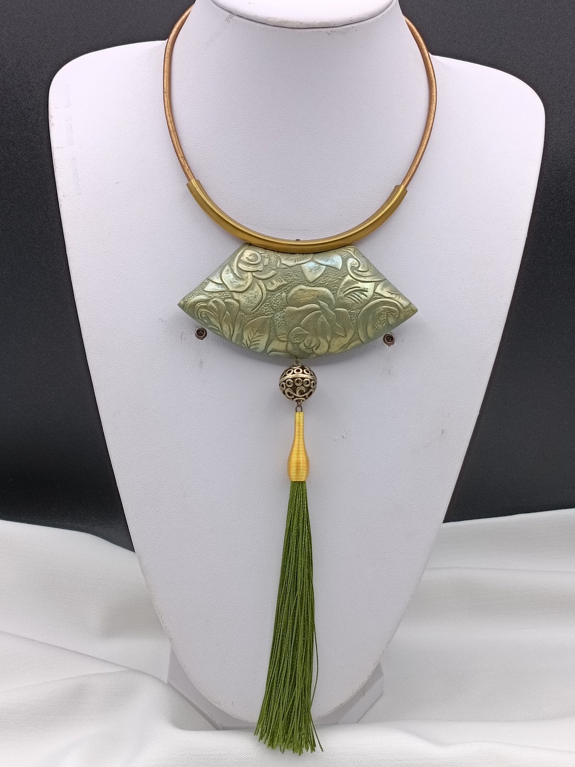 Bronze Metal Torque Leather Cord Necklace and Green Textured Polymer ...