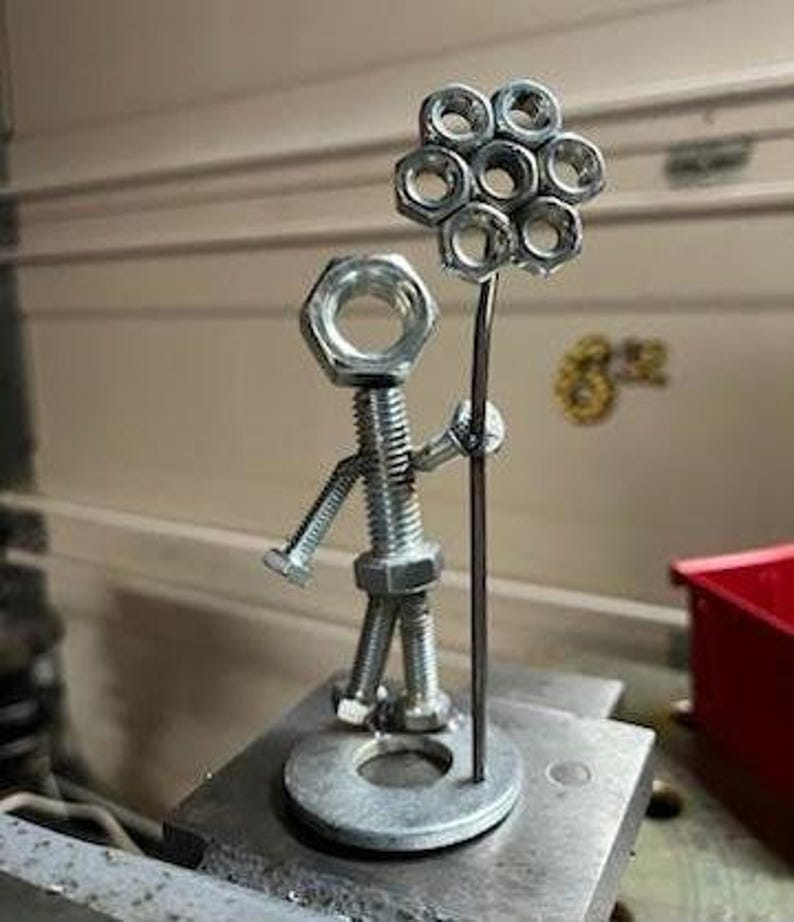 Welded Man/woman Holding/giving Welded Flower for Mother's Day ...