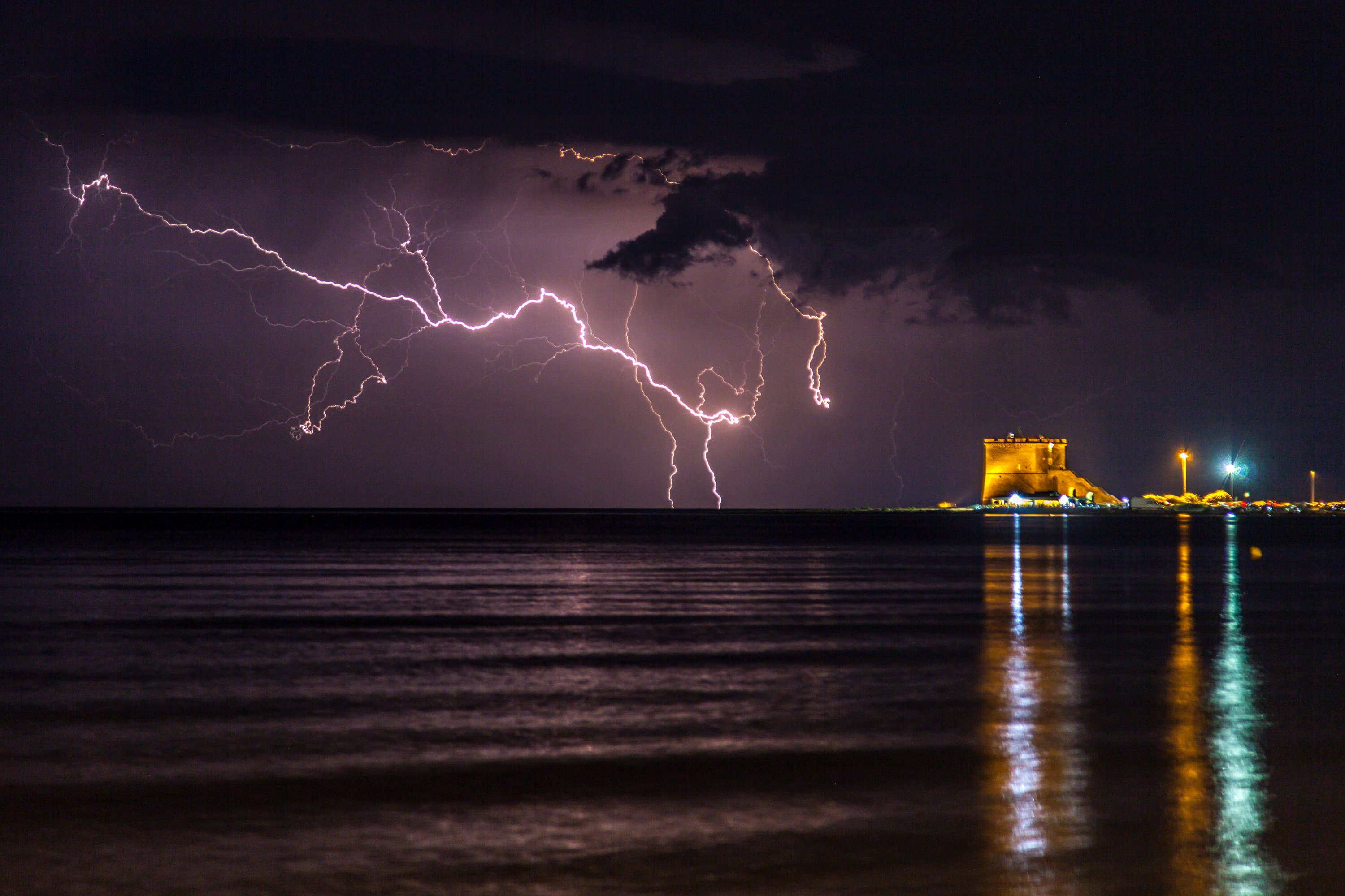 Printable - Impressive Lightning Bolt Above the Sea With a Tower in the ...