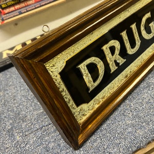Vintage Style Reverse Painted and Glue Chipped Glass Sign Displaying ...