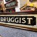 Vintage Style Reverse Painted and Glue Chipped Glass Sign Displaying ...