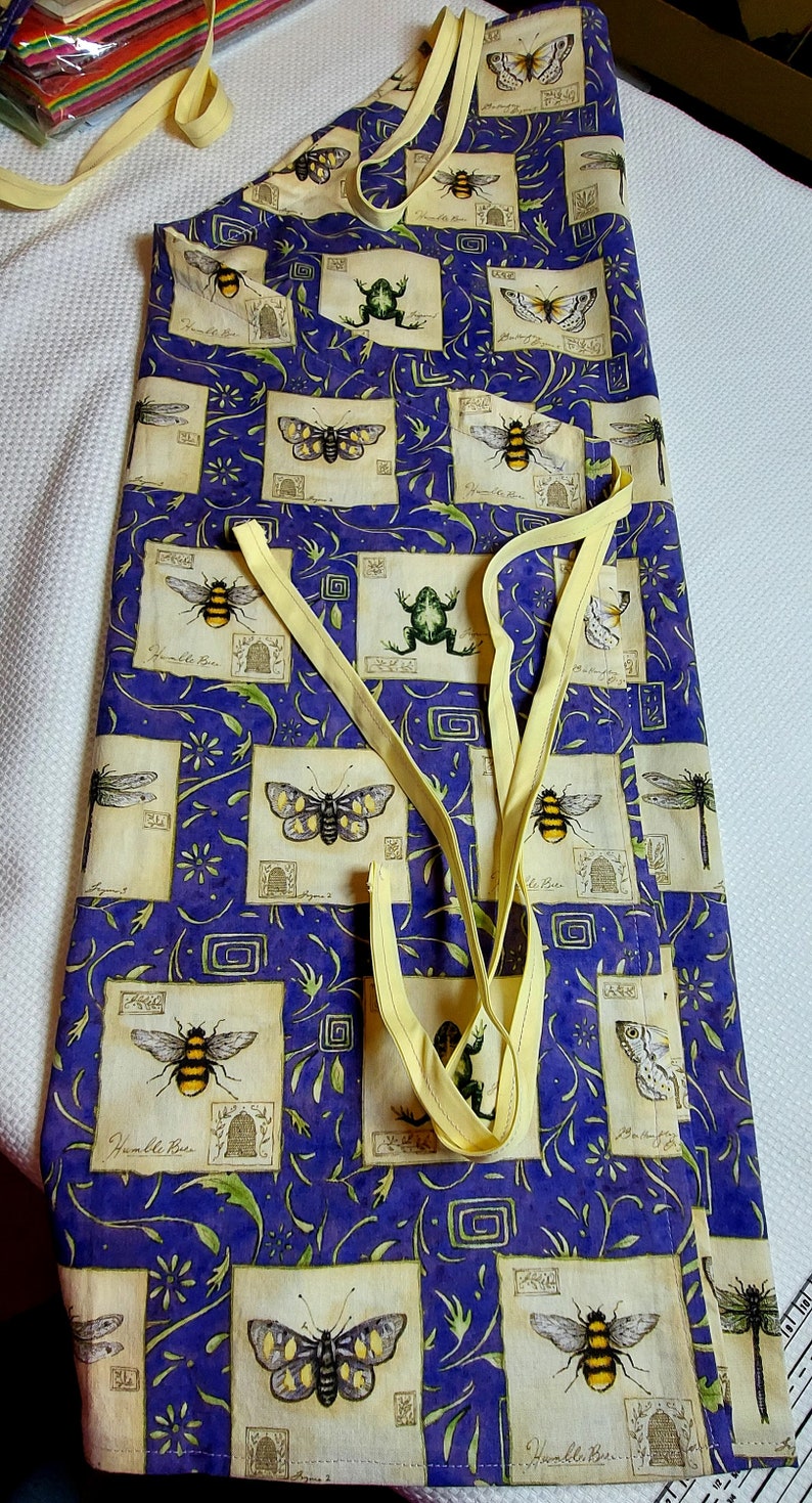 Purple Fabric With Graphics of Butterflies, Dragonflies, Frogs ...