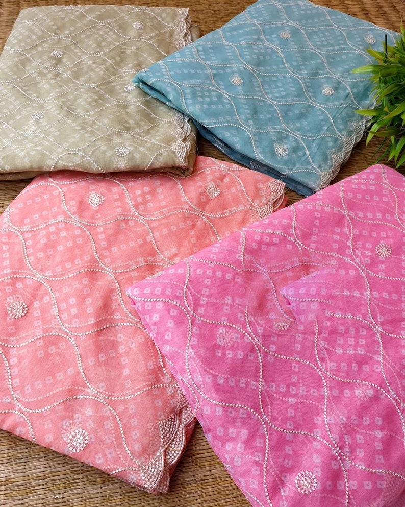 Pure Organza Saree With Bandini Print Nd Fancy Motif of White Thread ...