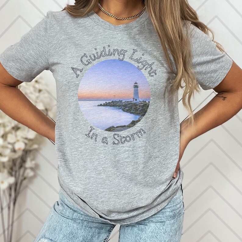 A Guiding Light in A Storm Lighthouse Shirt, Nautical Landscape Gift ...