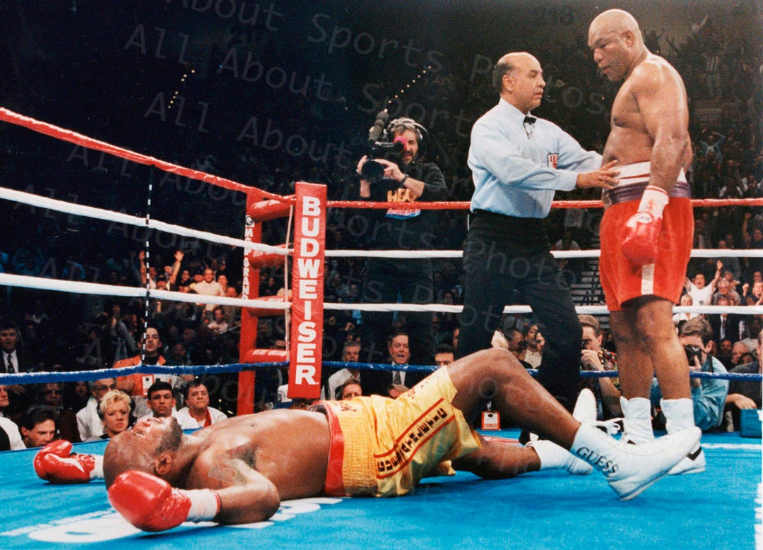George Foreman Defeats Michael Moorer and Becomes Oldest Heavyweight ...