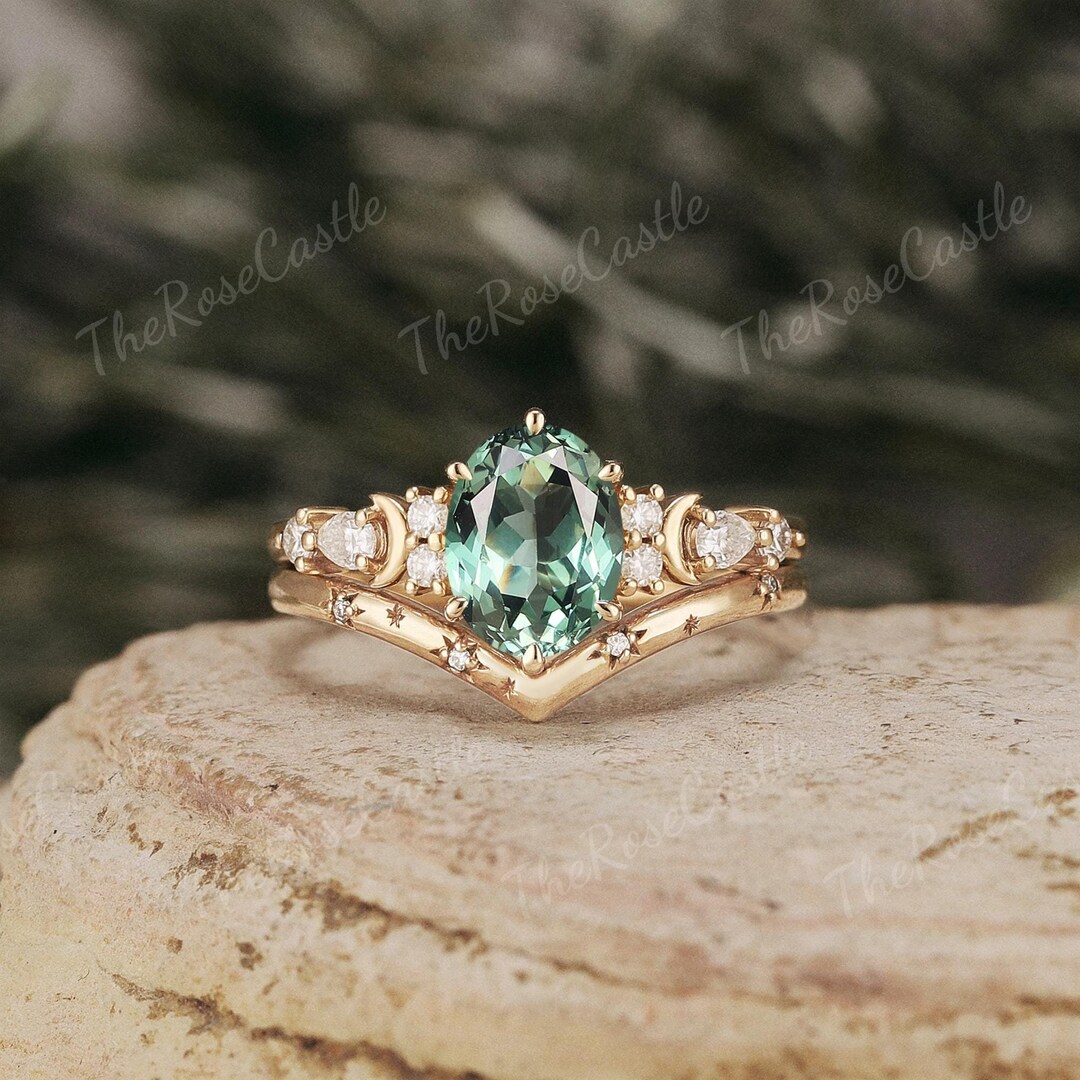 Conjunto de anillo de compromiso de zafiro verde de talla ovalada ...