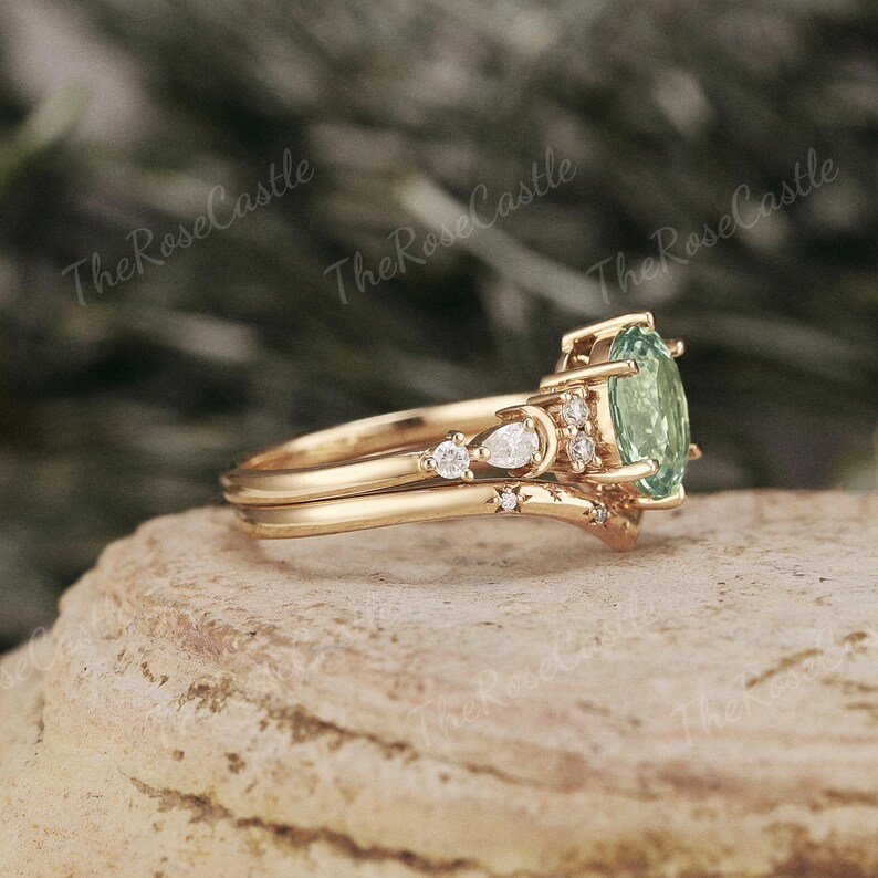 Conjunto de anillo de compromiso de zafiro verde de talla ovalada ...