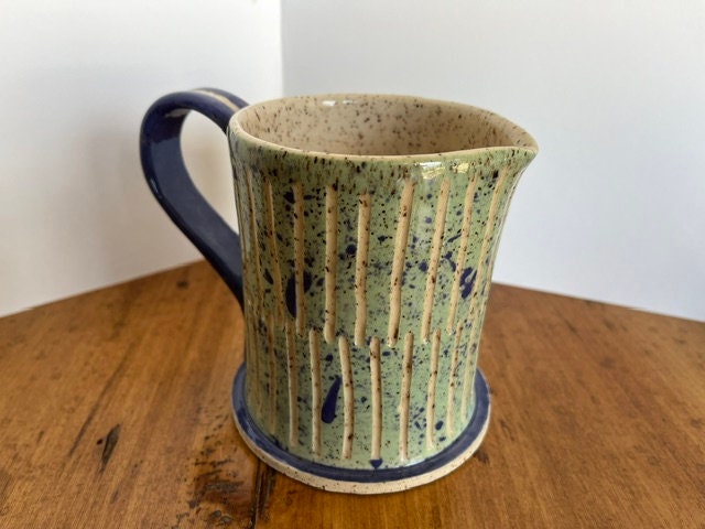Whimsical Water Pitcher - Etsy